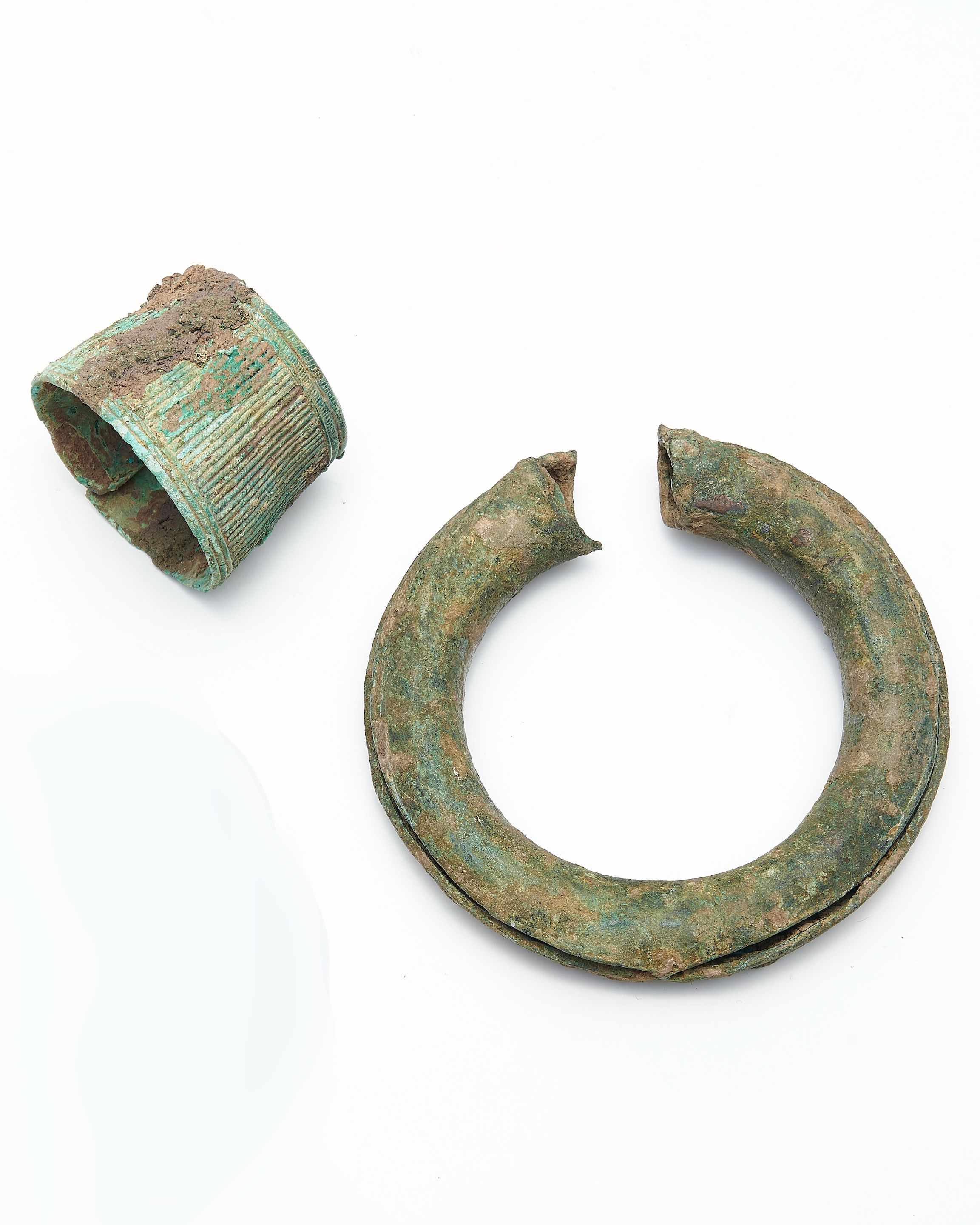 Bonhams : A bronze rattle bracelet or anklet, and a bronze bracelet ...