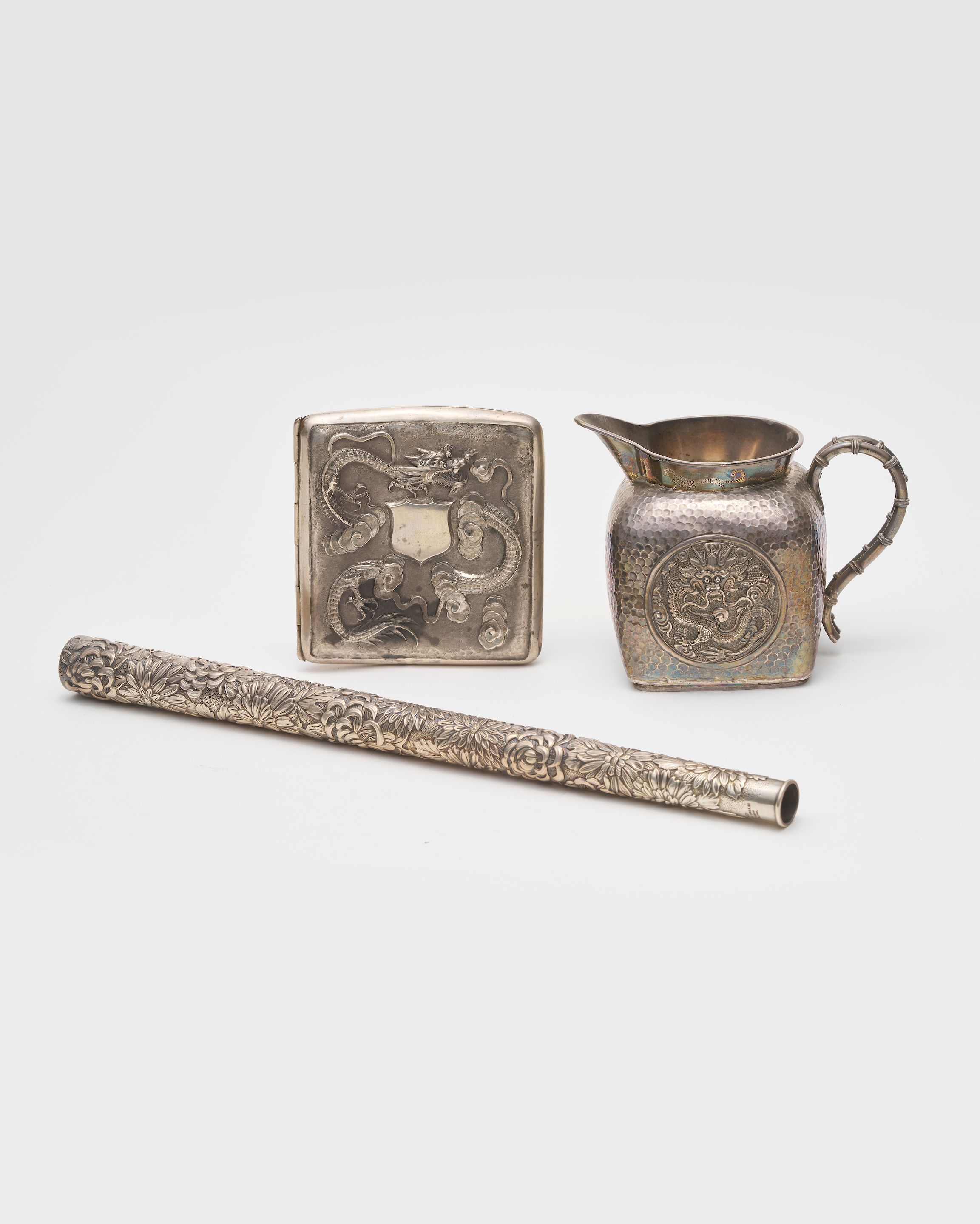 Bonhams : A silver pitcher, square case, and a pipe 19th century to ...