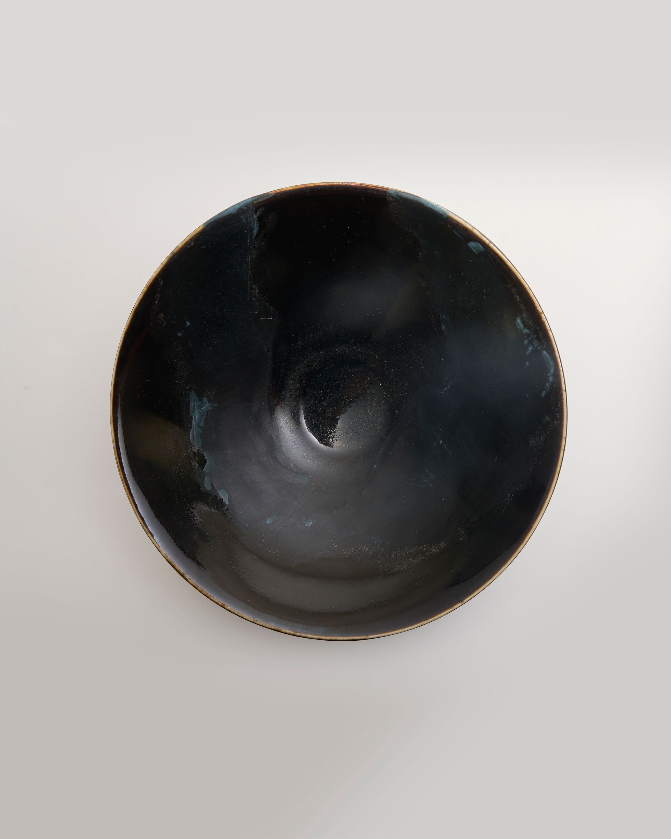 Bonhams : A ding-ware black glazed conical bowl, together with two ...