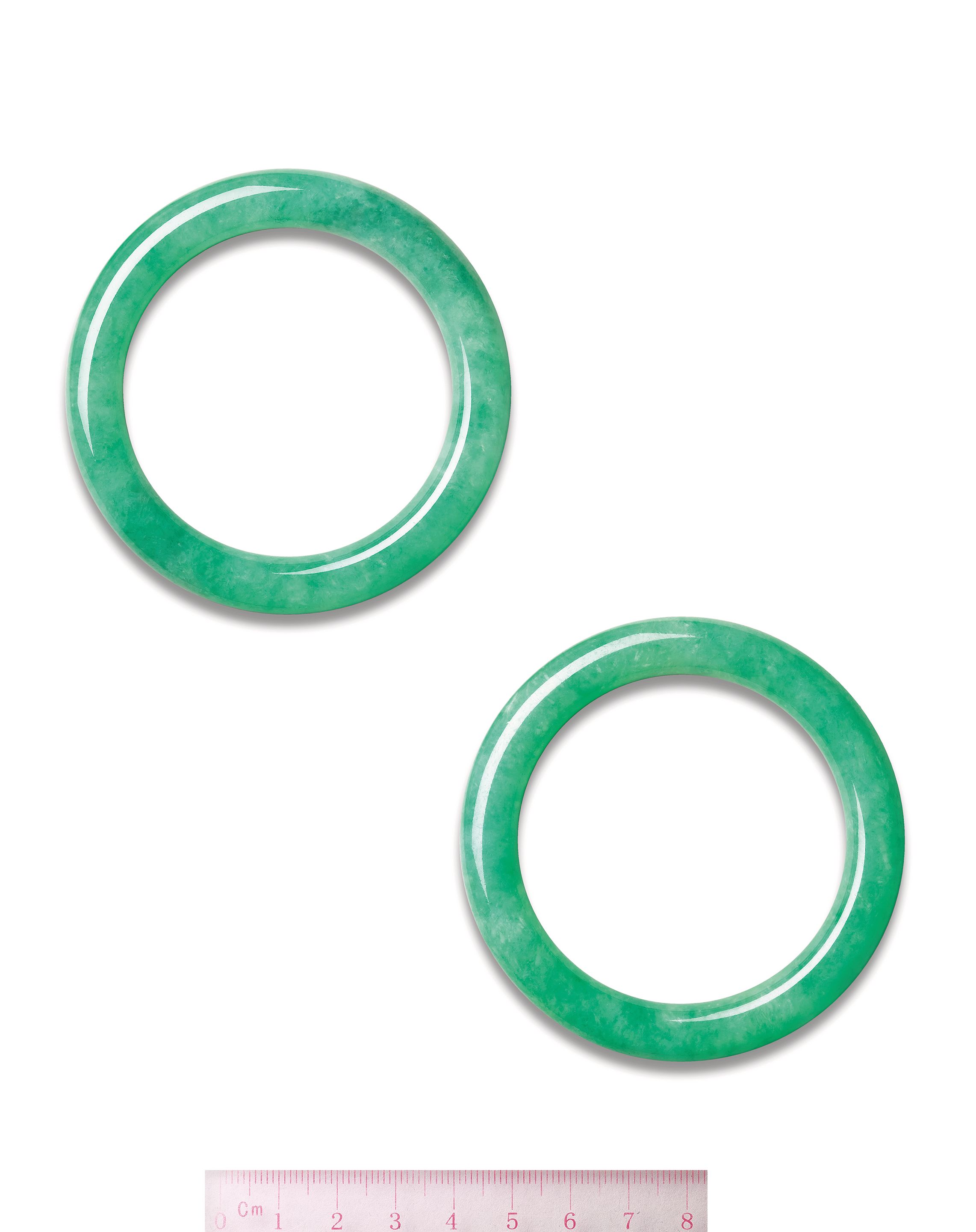 Bonhams : PAIR OF JADEITE BANGLES (2)