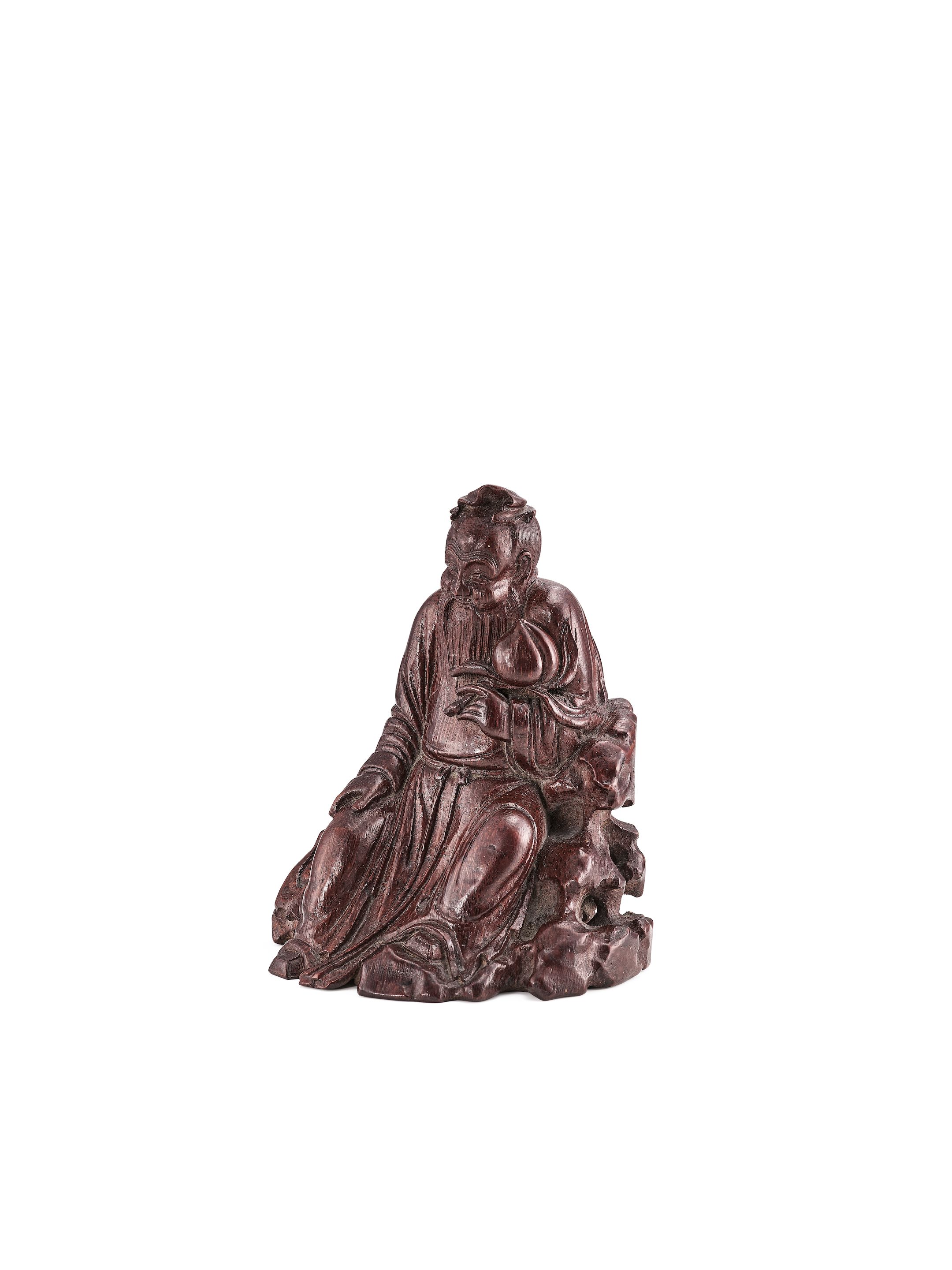 Bonhams : A FINELY CARVED BAMBOO FIGURE OF SEATED SHOULAO 18th/19th century