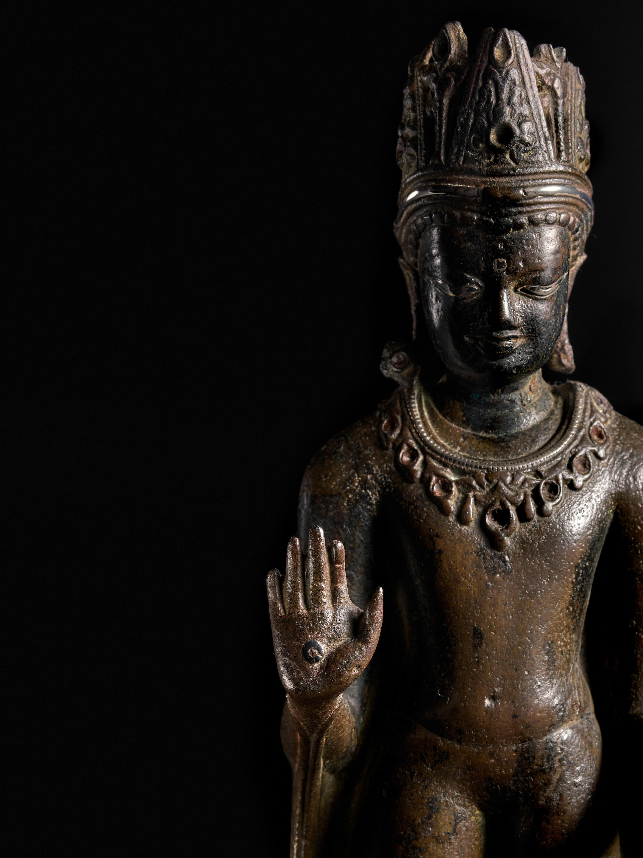 Bonhams A Silver Inlaid Copper Alloy Figure Of Crowned Buddha