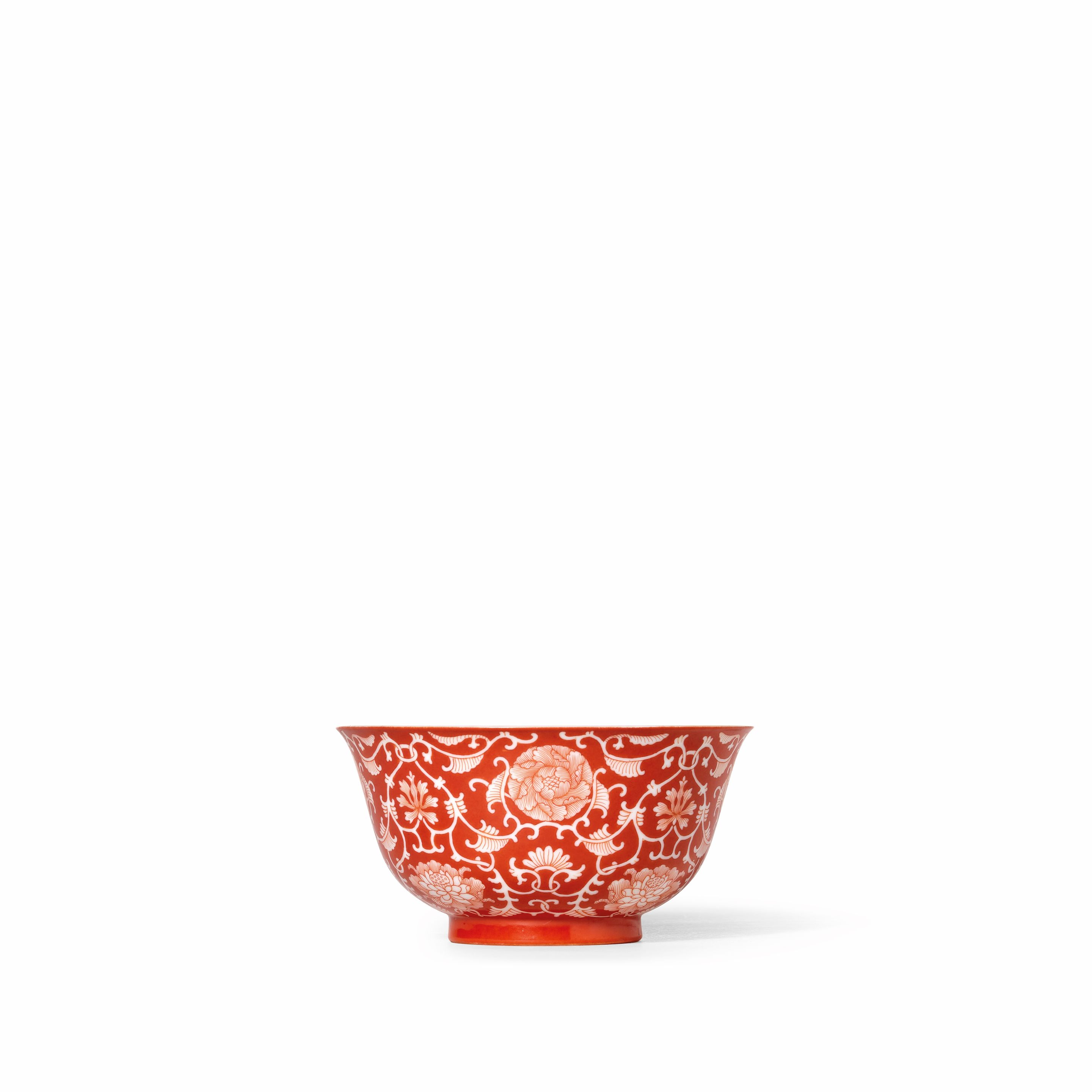 Bonhams : A RARE CORAL-RED RESERVE-DECORATED 'FLORAL' BOWL Iron-red Cai ...