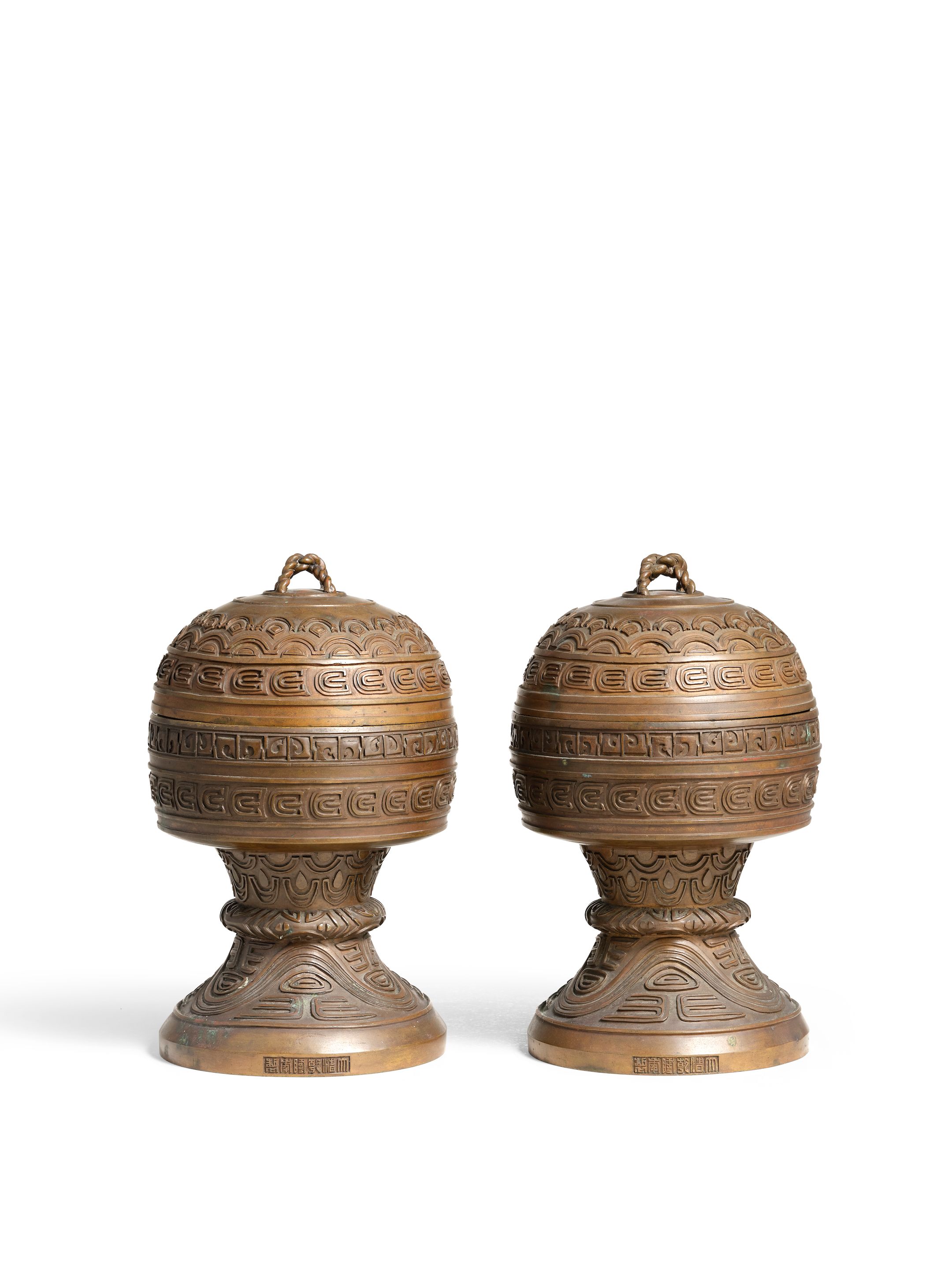 Bonhams : A RARE PAIR OF ARCHAISTIC BRONZE RITUAL VESSELS AND COVERS ...