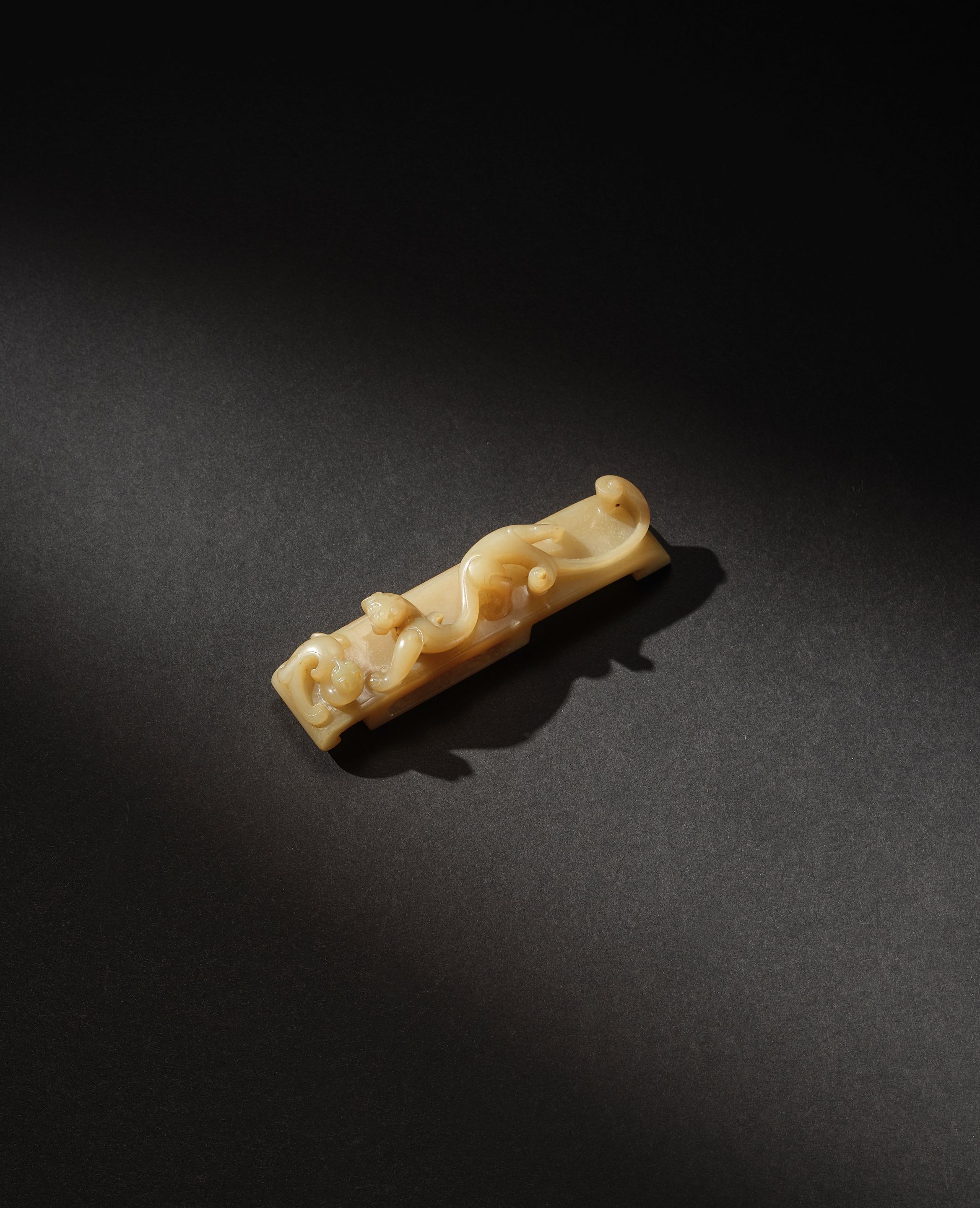 Bonhams : A JADE 'CHILONG' SCABBARD SLIDE Han Dynasty