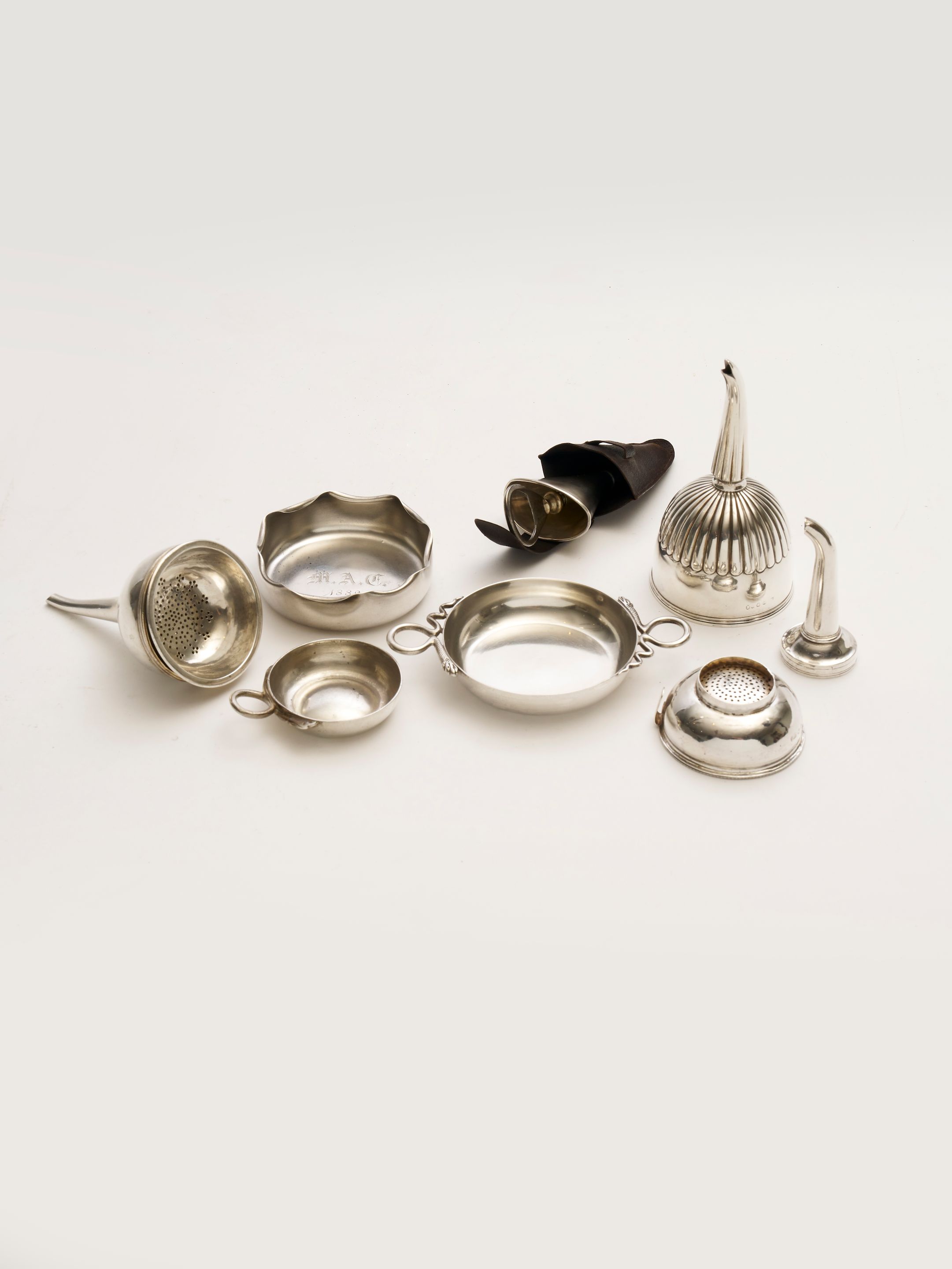 Bonhams : A collection of strainers, tastevin and funnels English and ...